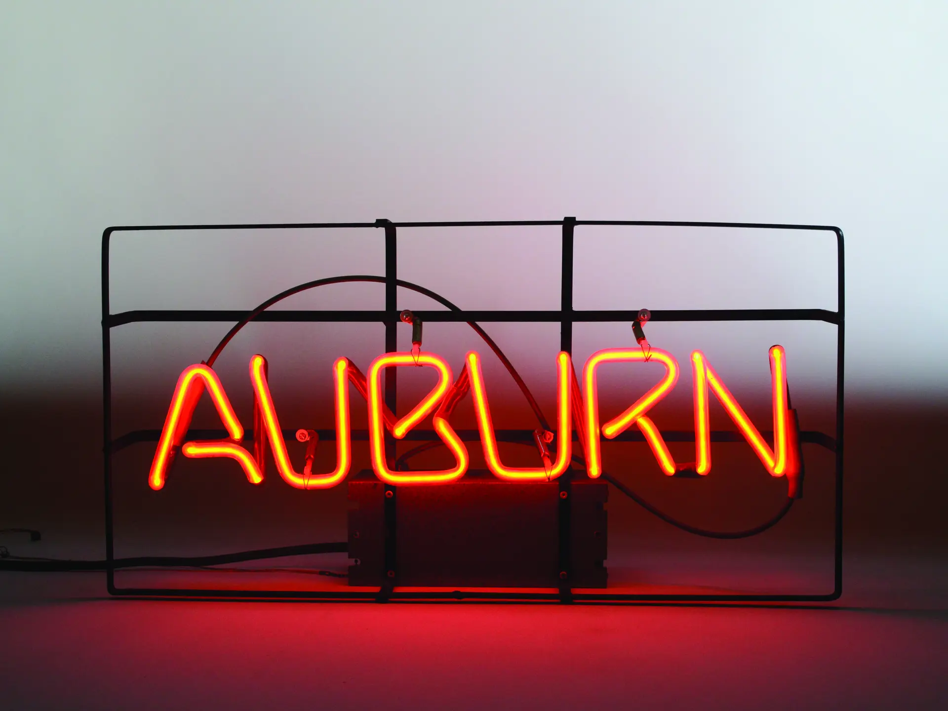 An Auburn neon sign. | Auburn Spring 2017 | RM Sotheby's