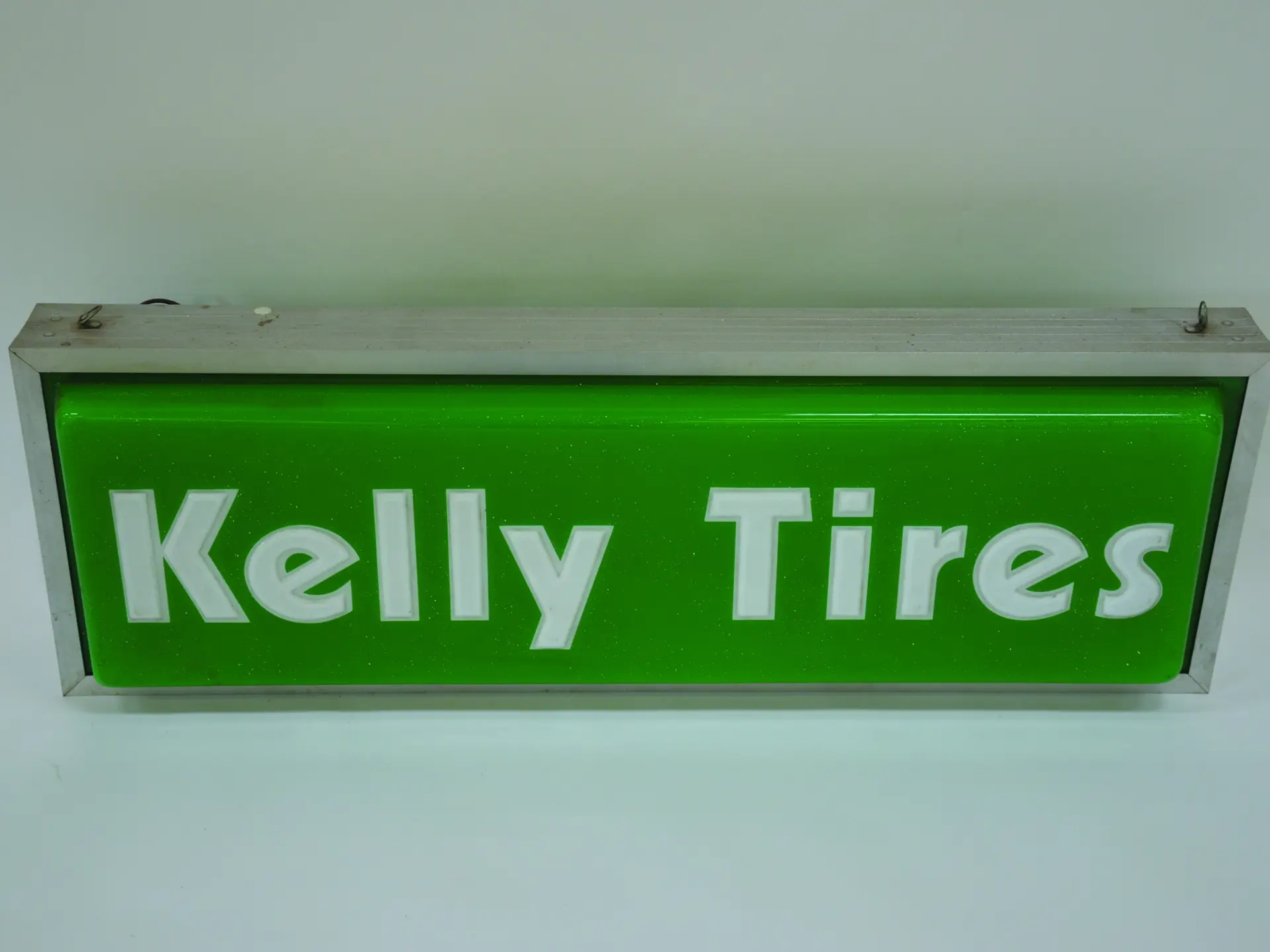 A ‘Kelly Tires’ sign, double sided illuminated sign | Auburn Fall 2016 ...
