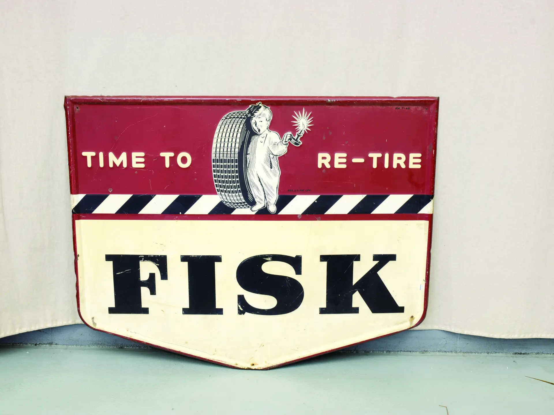 A single-sided, tin painted, “Time to Retire” Fisk Tires sign, circa ...
