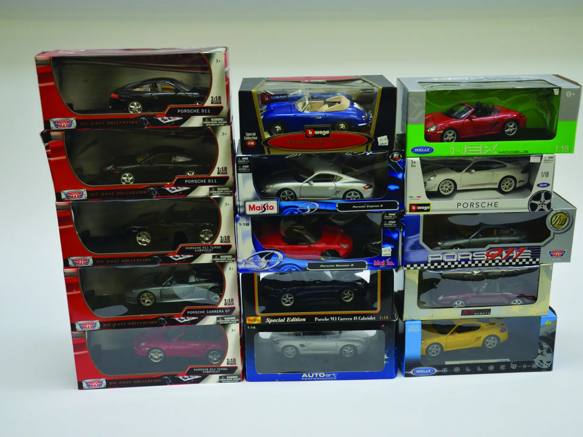 15 boxed 1/18 scale Porsche models various colors and model years ...