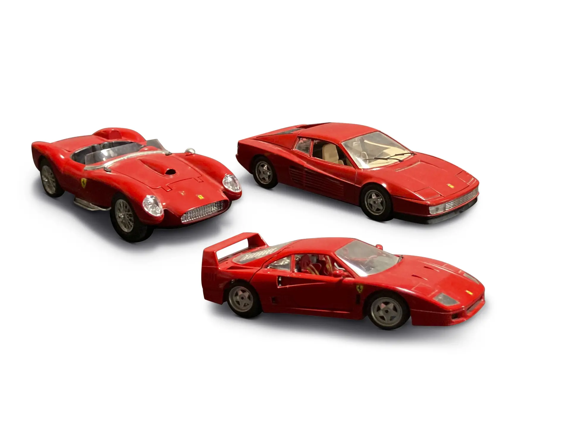 1957 Ferrari 250 Testa Rossa, 1984 Ferrari Testarossa, and 1987 Ferrari ...