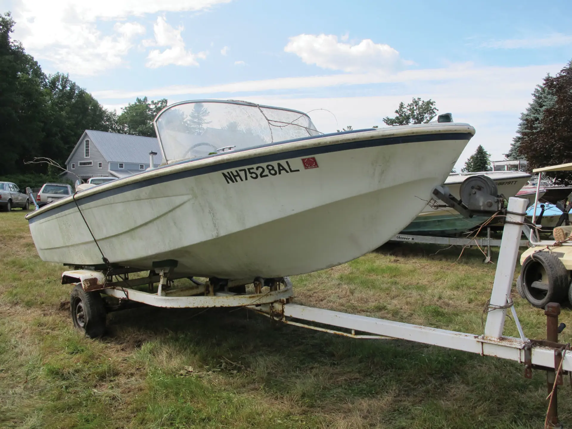 Boat "14-Foot" with Trailer and Johnson Outboard | The Bennett ...