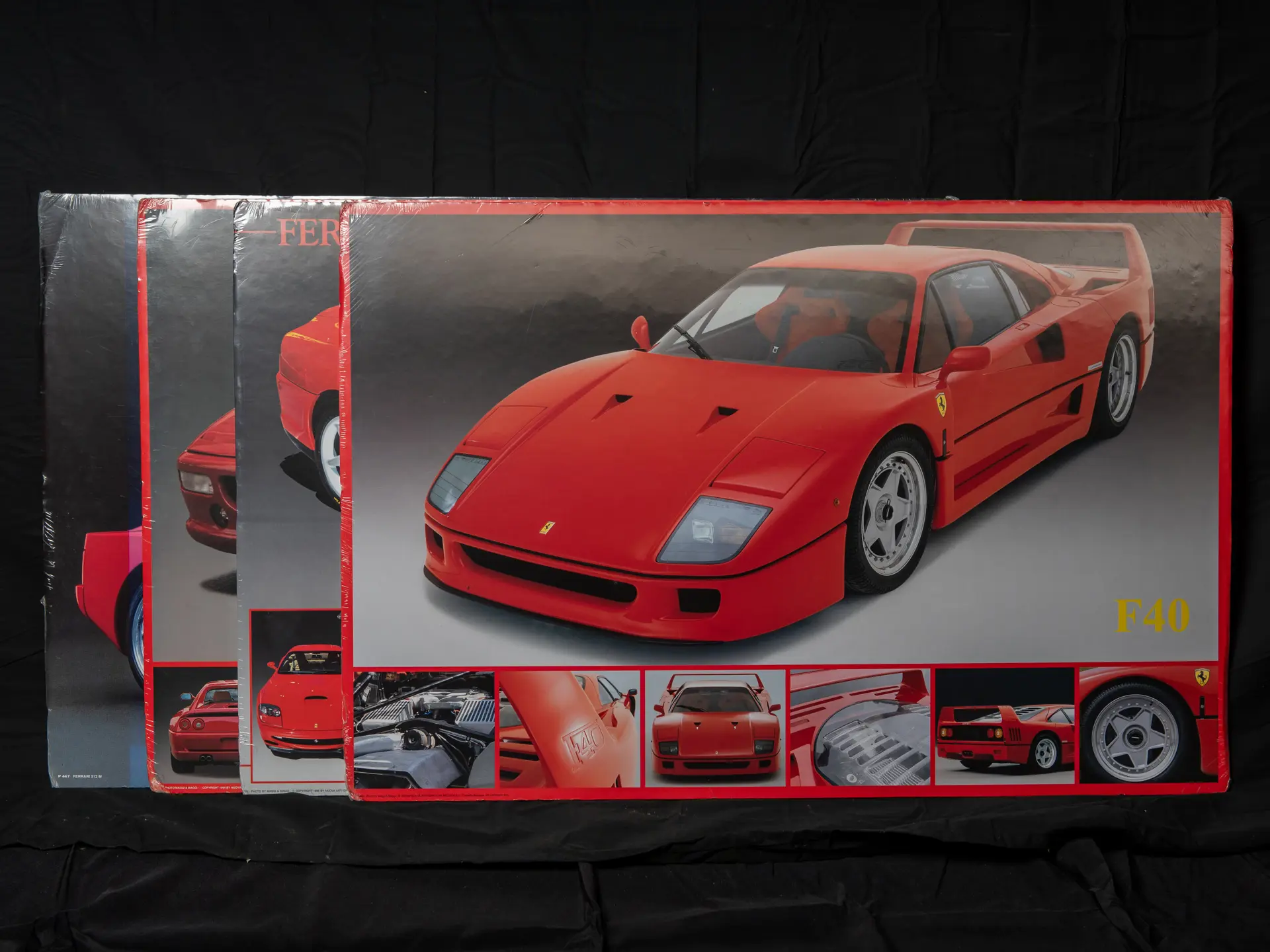 Four Ferrari Advertising Boards | Open Roads, February 2022 | RM Sotheby's