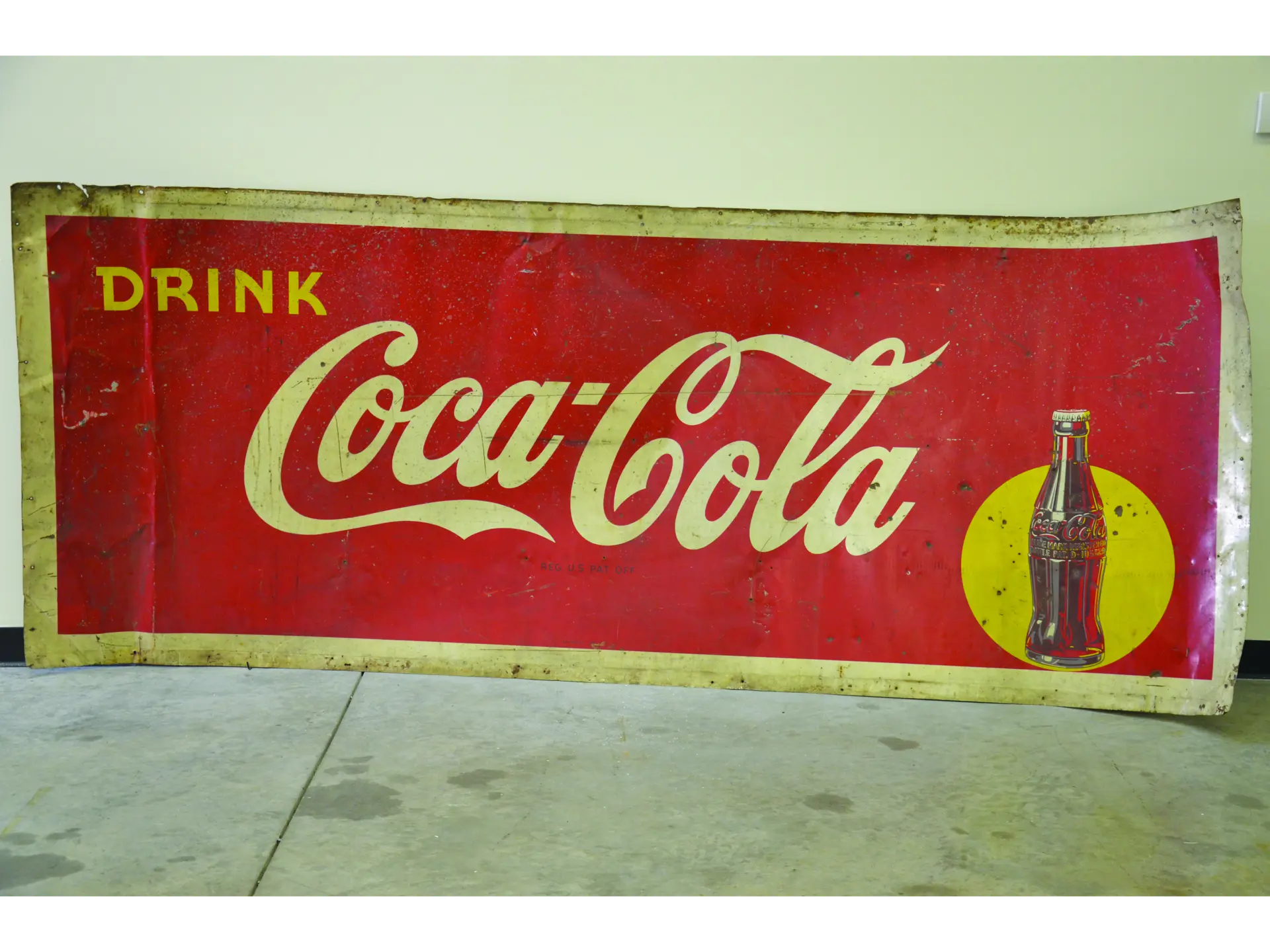A large, single-sided, tin painted ‘Coca-Cola’ sign, 118" x 47 ...
