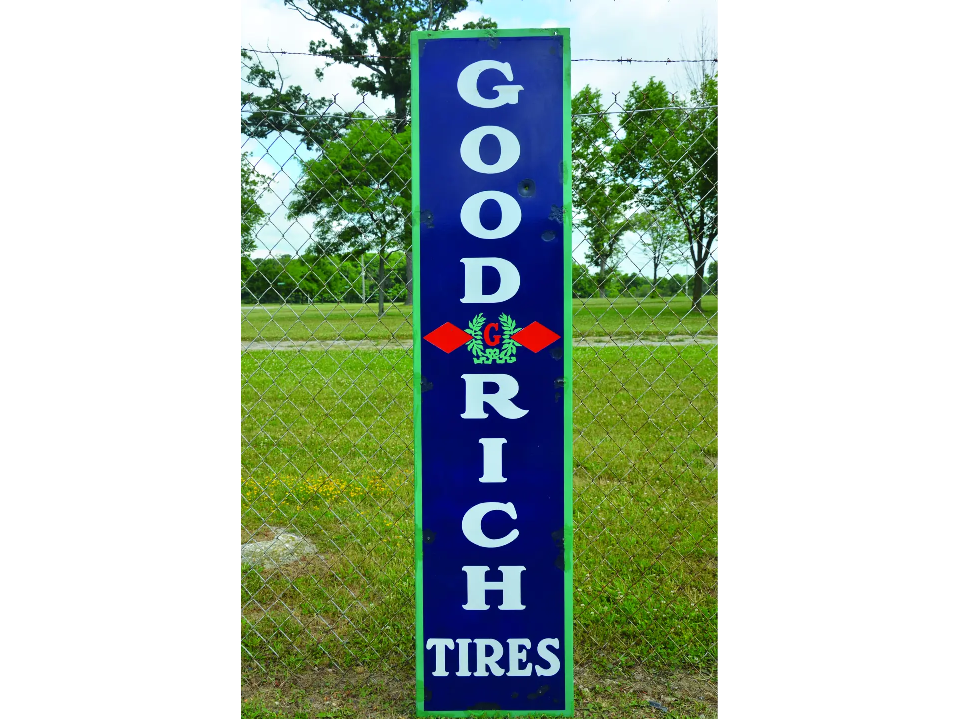 A porcelain Goodrich Tires sign. | Auburn Fall 2016 | RM Sotheby's