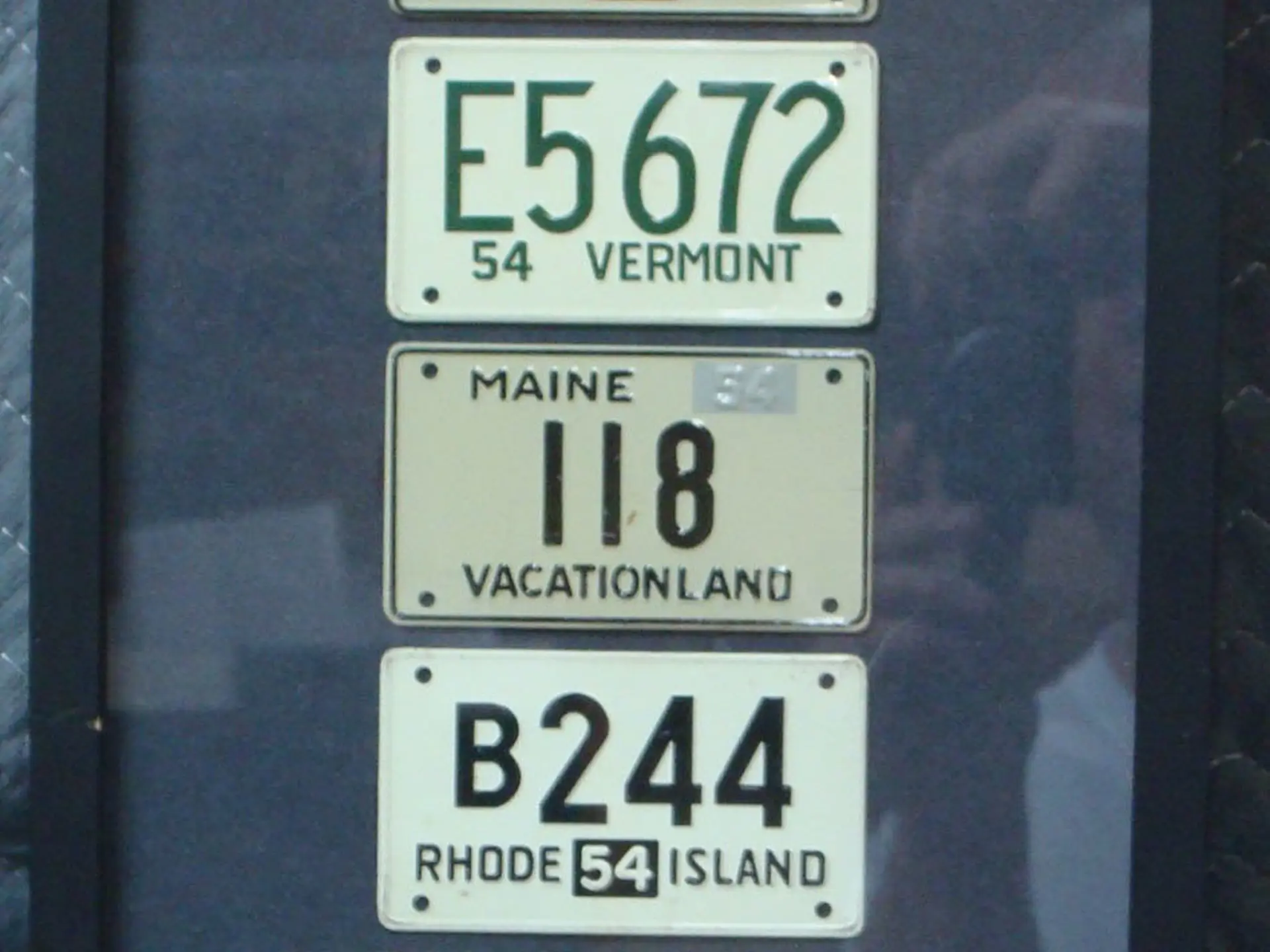 Framed Assortment of 1954 Miniature License Plates Connecticut, Vermont ...