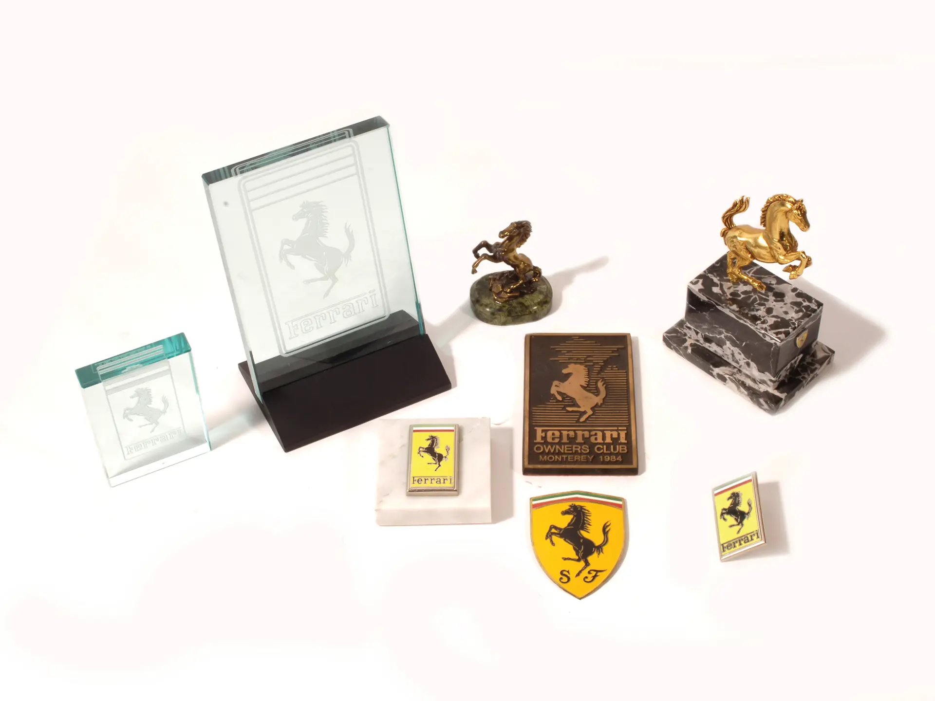 FERRARI DESK ACCESSORIES AND BADGES | The Ponder Collection | RM Sotheby's