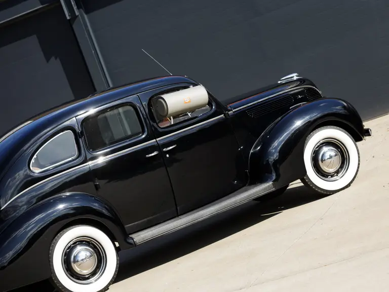 1938 Ford Model 81A DeLuxe Fordor Sedan | Hershey 2022 | RM Sotheby's