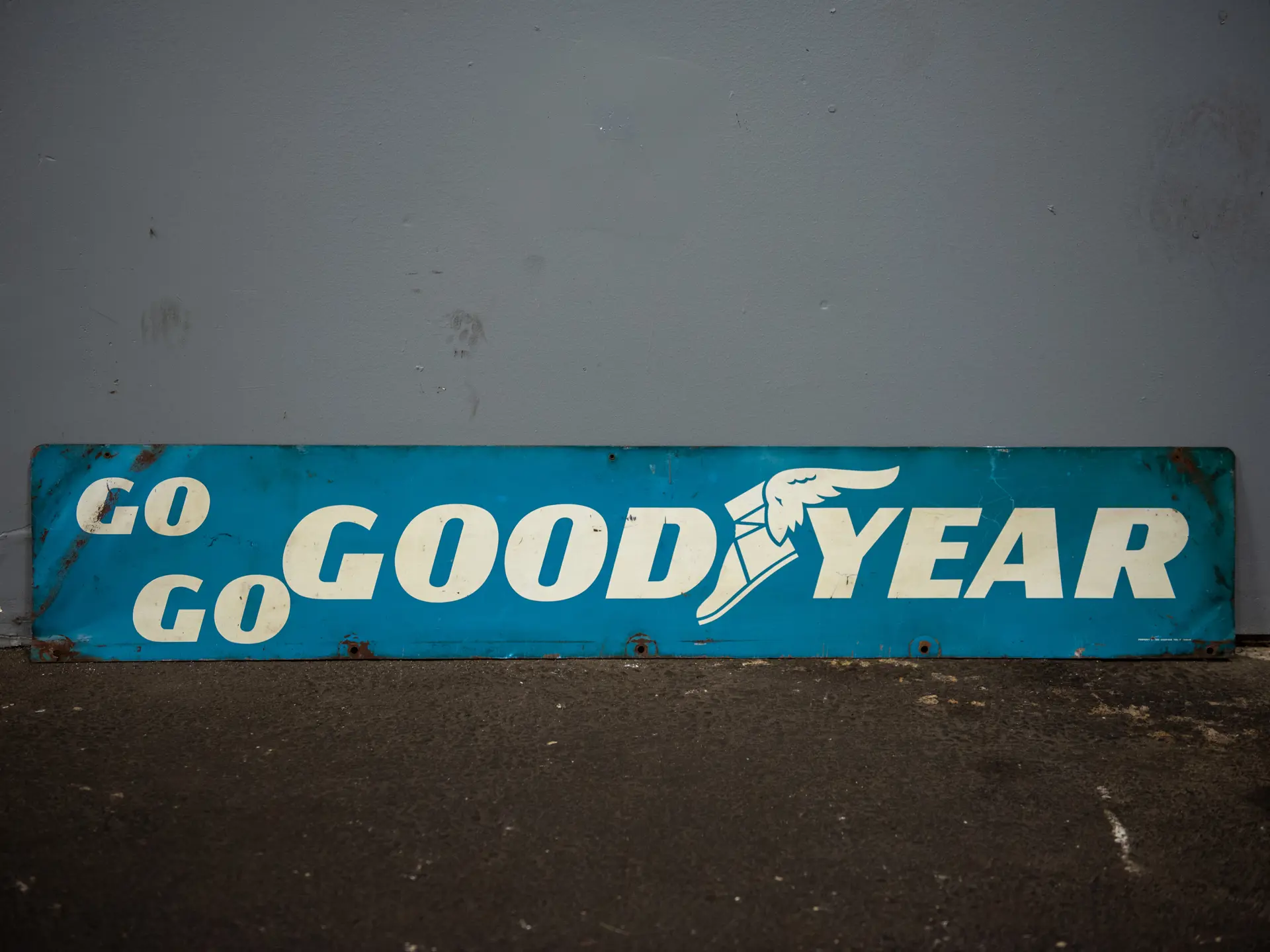 Go Go Goodyear Double-Sided Tin Sign | Auburn Fall 2021 | RM Sotheby's