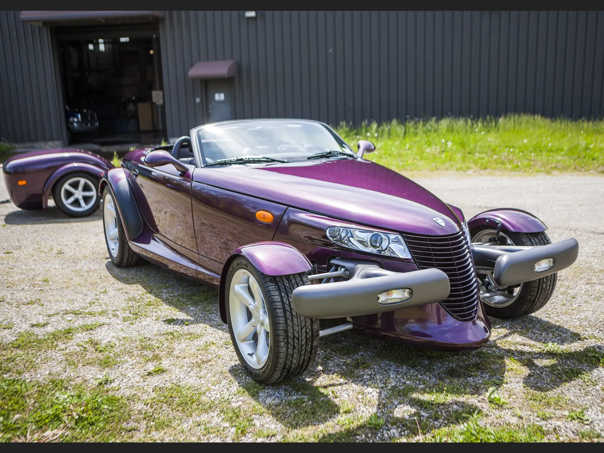 1997 Plymouth Prowler with Trailer | Driving into Summer | RM Sotheby's