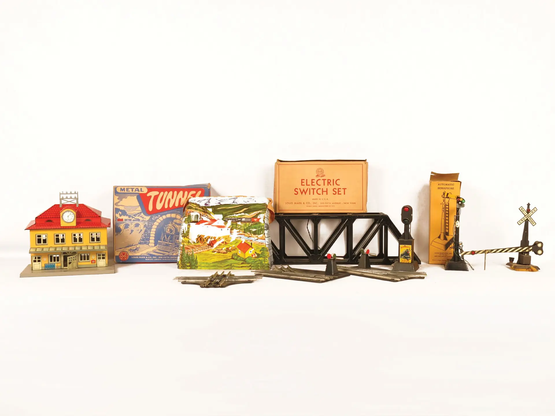 Assortment of Metal Train Displays, Marx Crossing, and Three Marx ...
