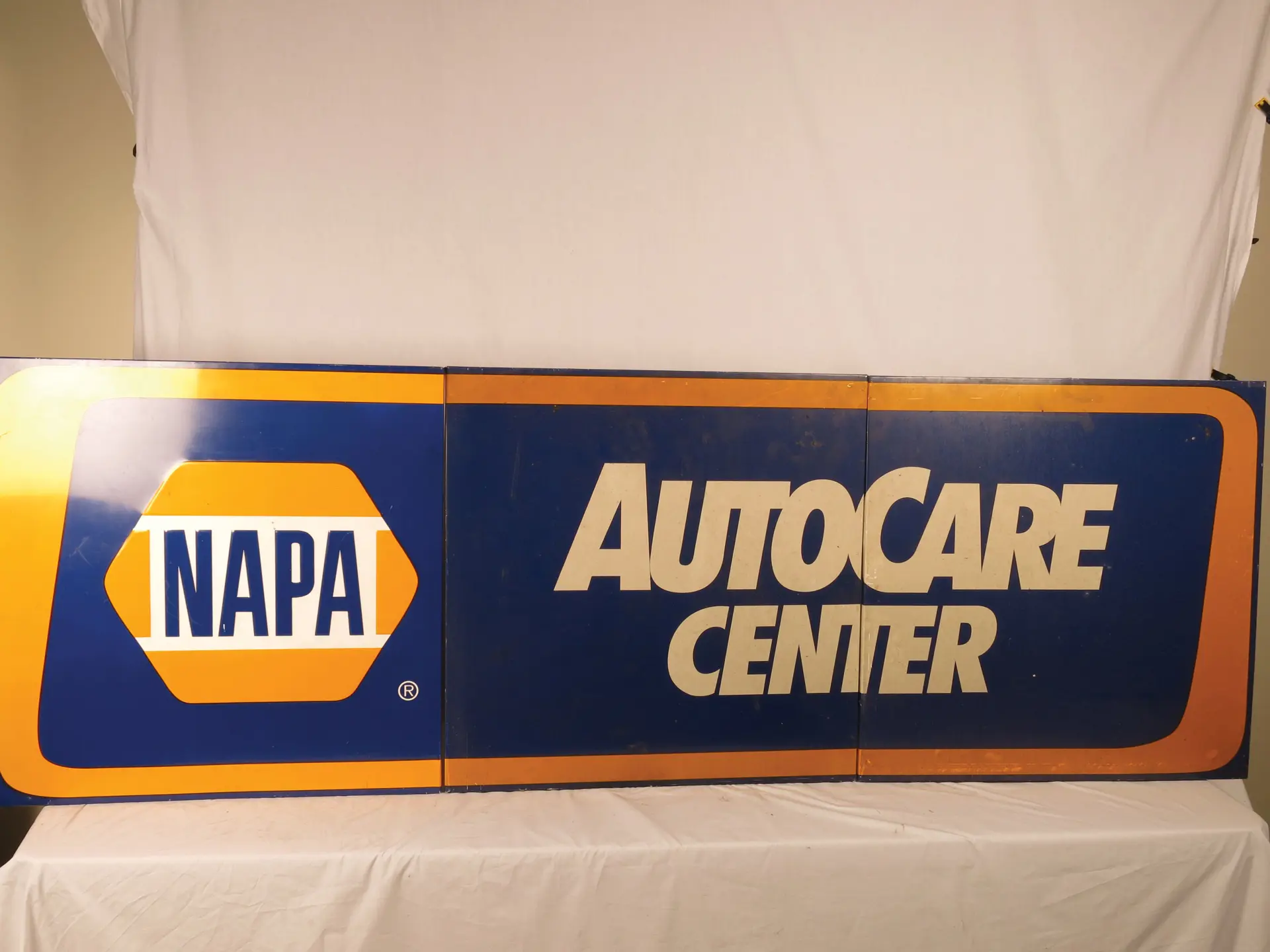 Three Piece NAPA Tin Sign (35" X 105") | Auburn Fall 2013 | RM Sotheby's