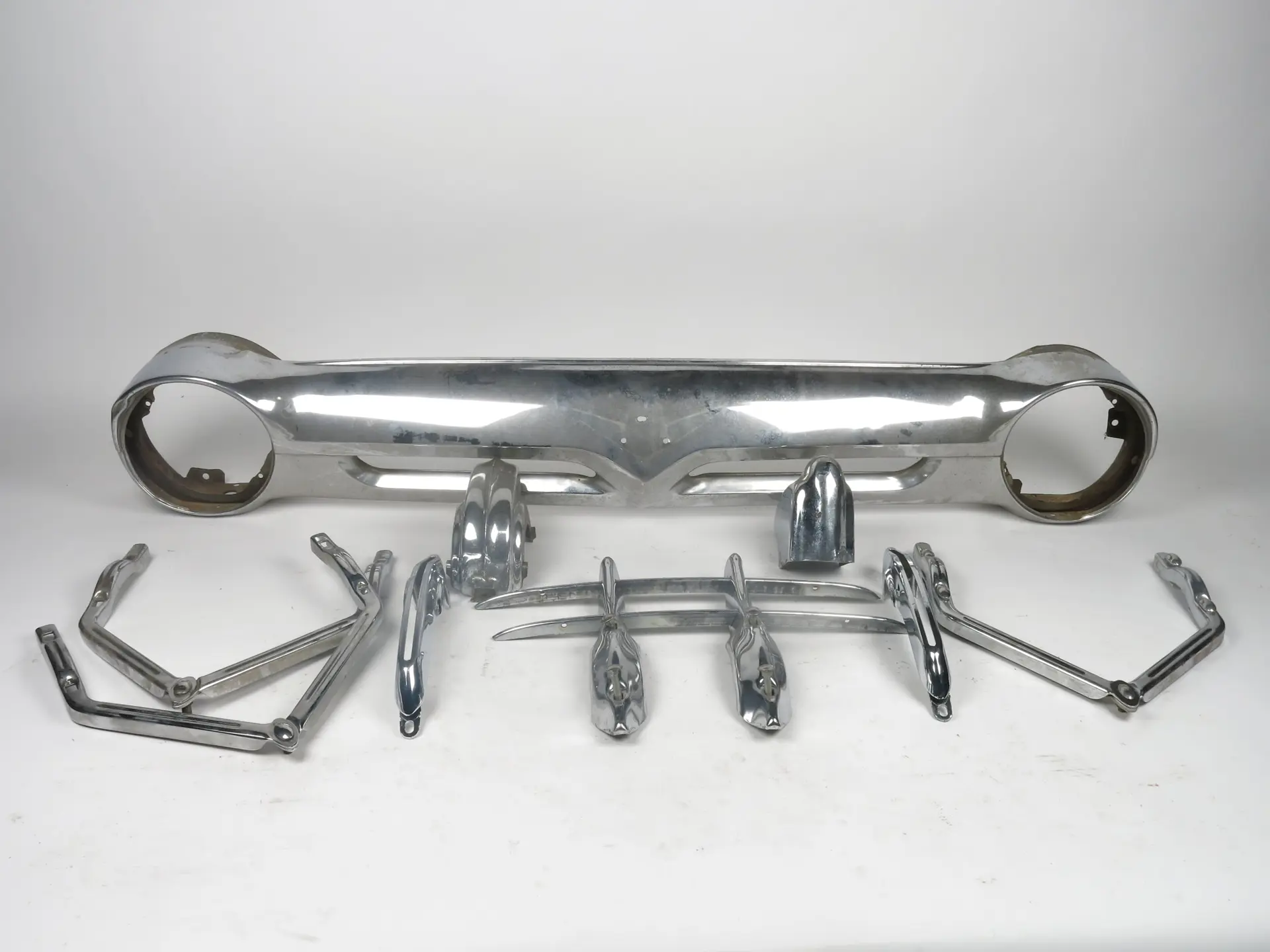 1956 Ford F100 chrome grille, Mercury bumperettes, and several ...