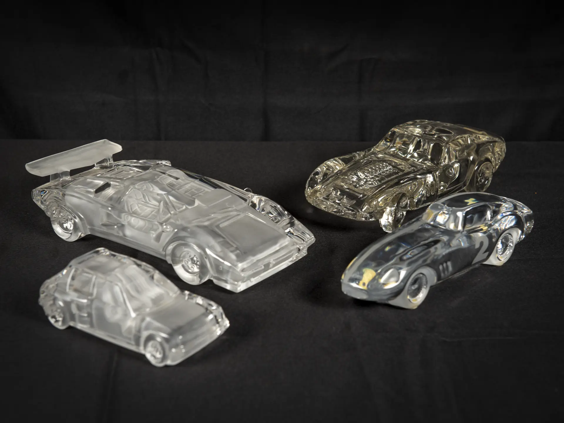 Four Glass Car Sculptures | Open Roads, December 2021 | RM Sotheby's