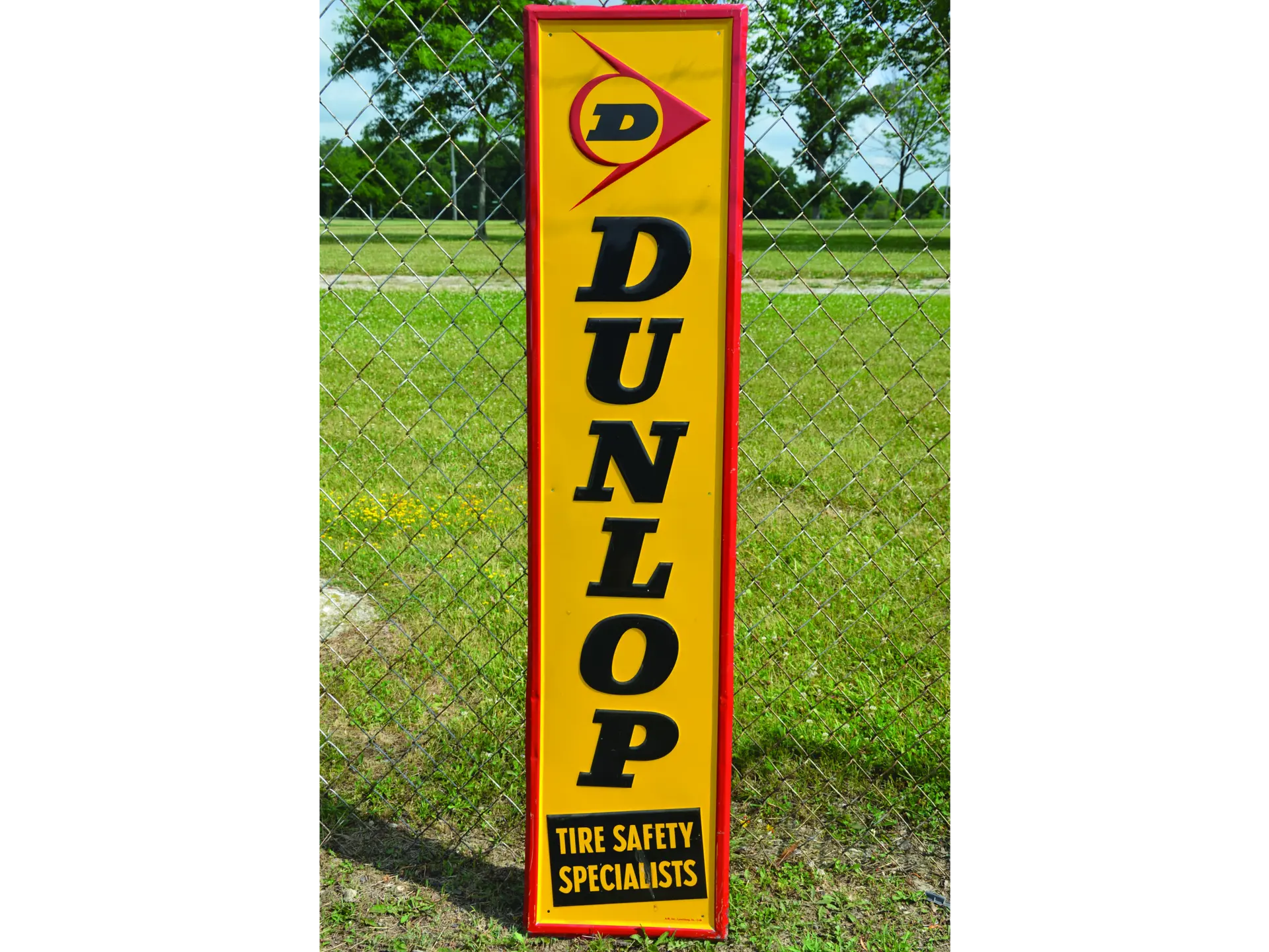 ‘Dunlop Tire Safety Specialist’ sign | Auburn Fall 2016 | RM Sotheby's