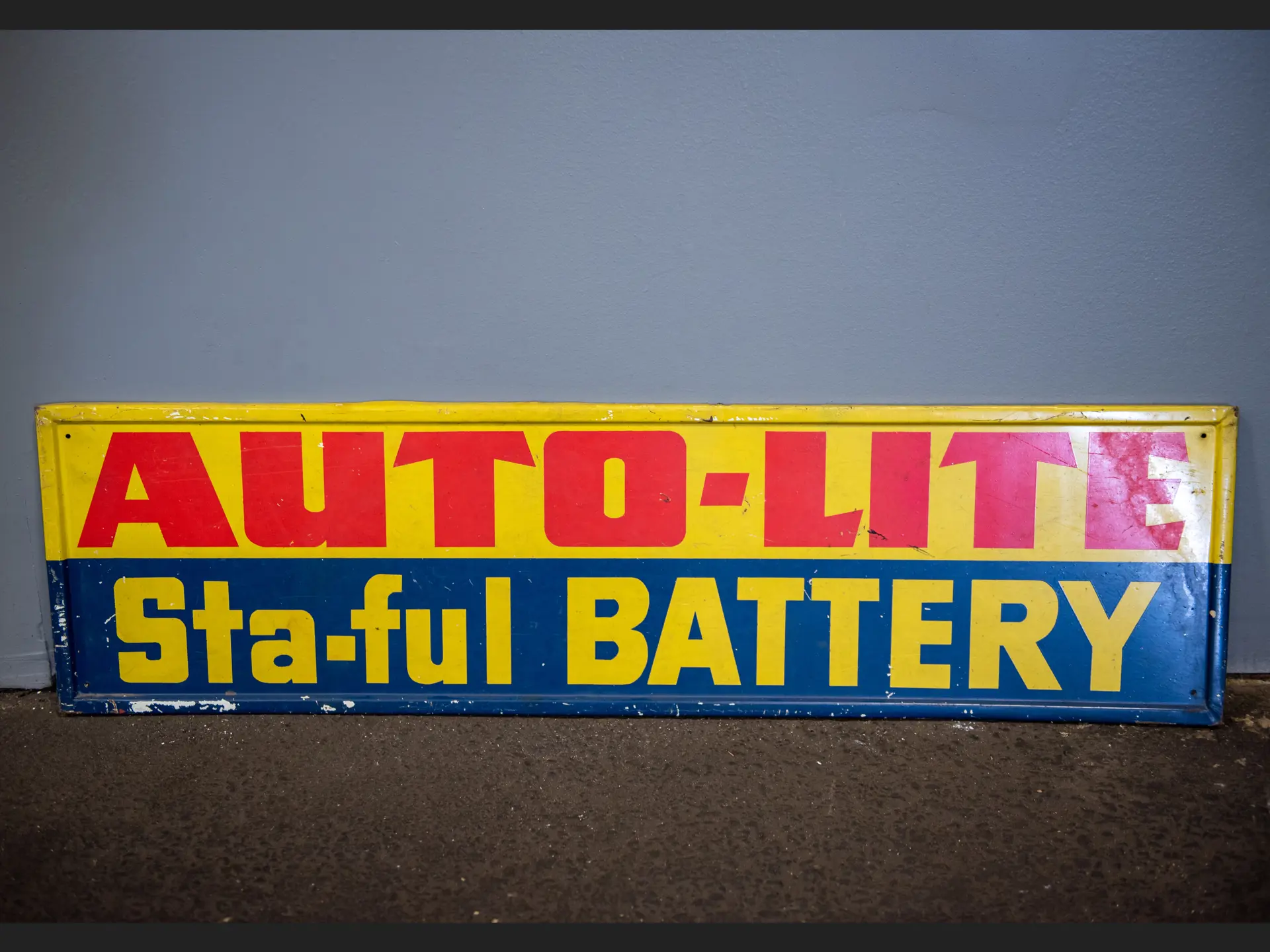 Auto-Lite Sta-ful Battery Tin Sign | Auburn Fall 2021 | RM Sotheby's