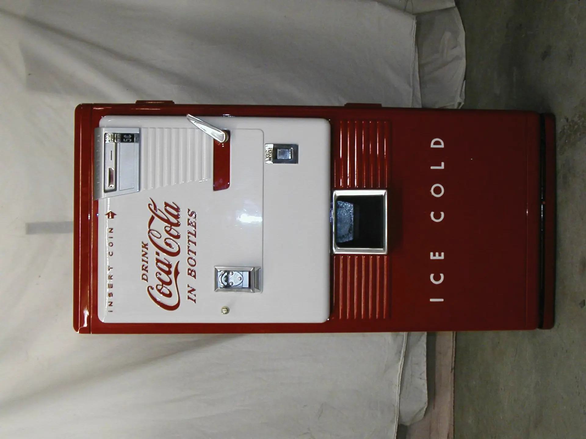 1940's fully restored 5 cent vending Coca-Cola machine. Manufactured by ...