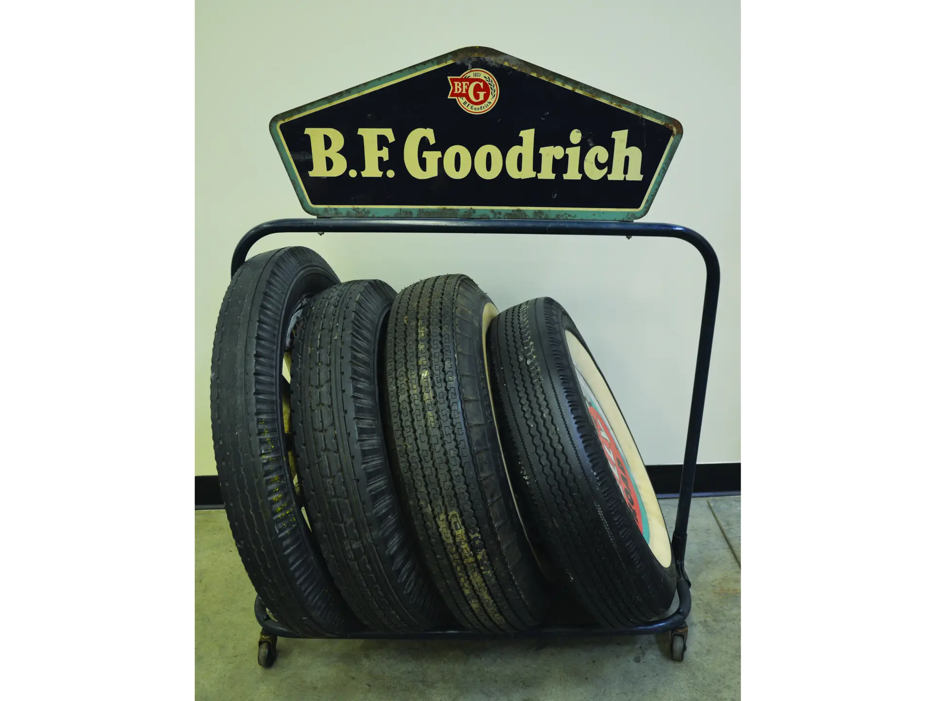 An original ‘BF Goodrich’ tire rack. | Auburn Fall 2016 | RM Sotheby's