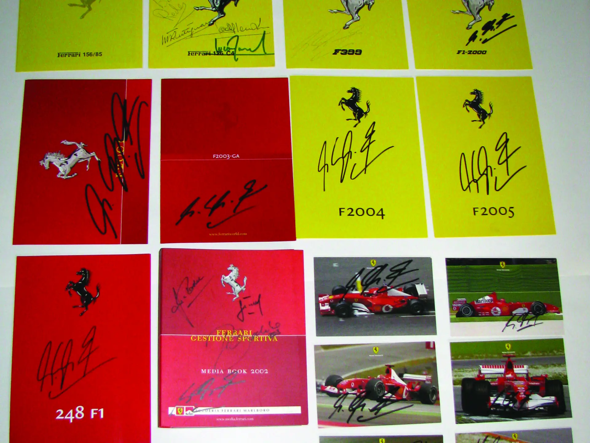 A SELECTION OF FERRARI F1 MEDIA AND POSTCARD MATERIAL | Ferrari ...