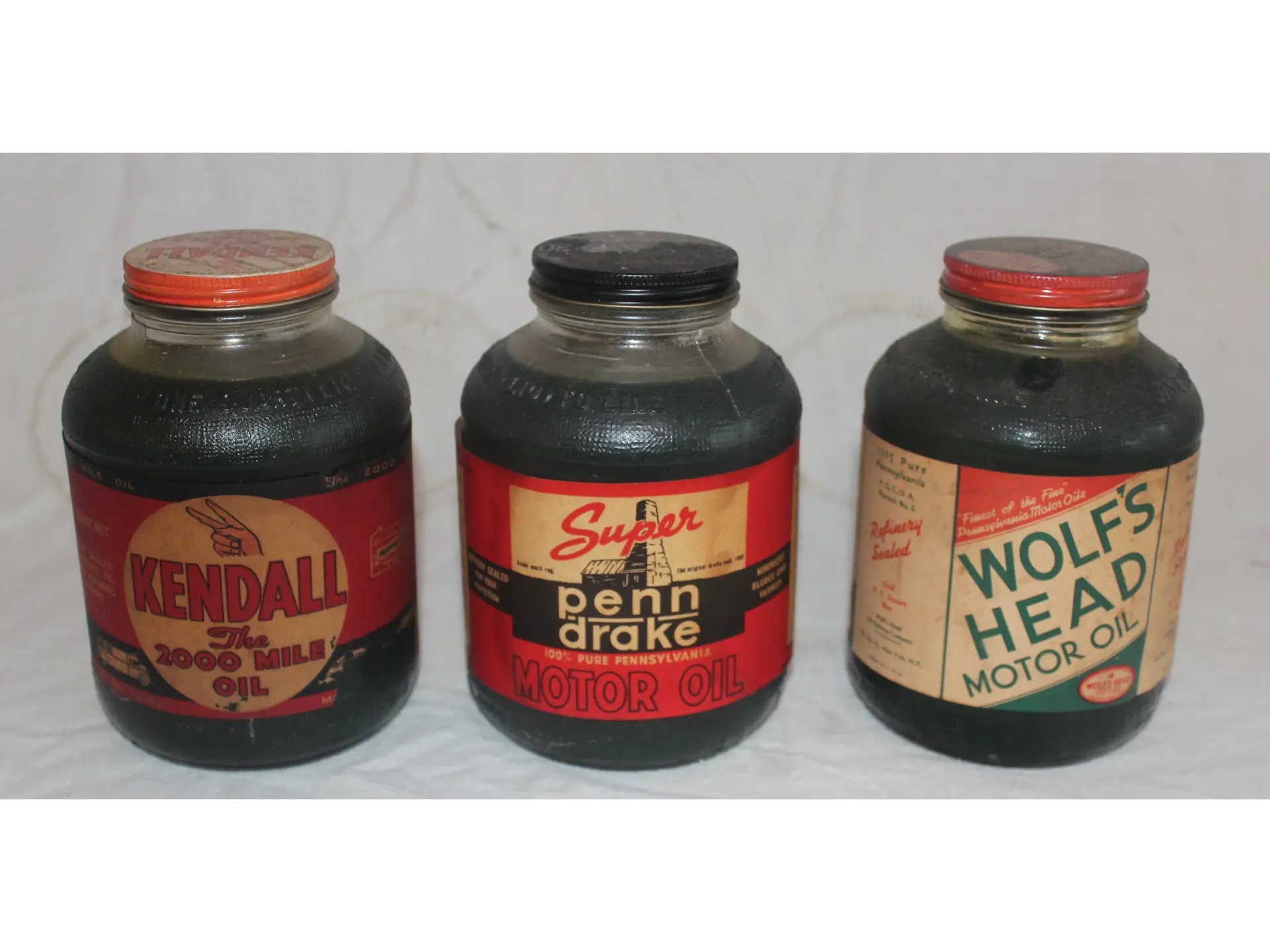 Glass Oil Bottles, Full, Three Pieces | Auburn Spring 2018 | RM Sotheby's