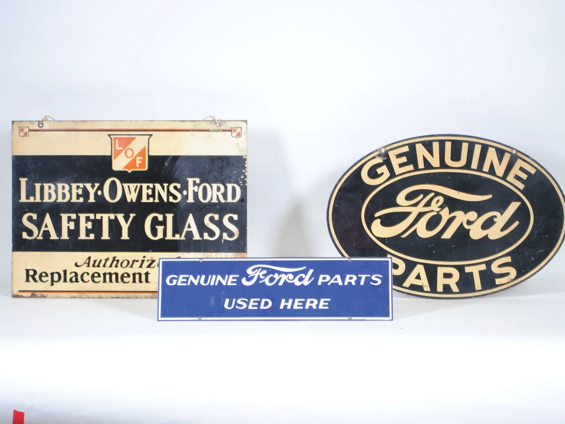 A lot of 3 Ford parts signs, 24"x18" | Auburn Spring 2016 | RM Sotheby's