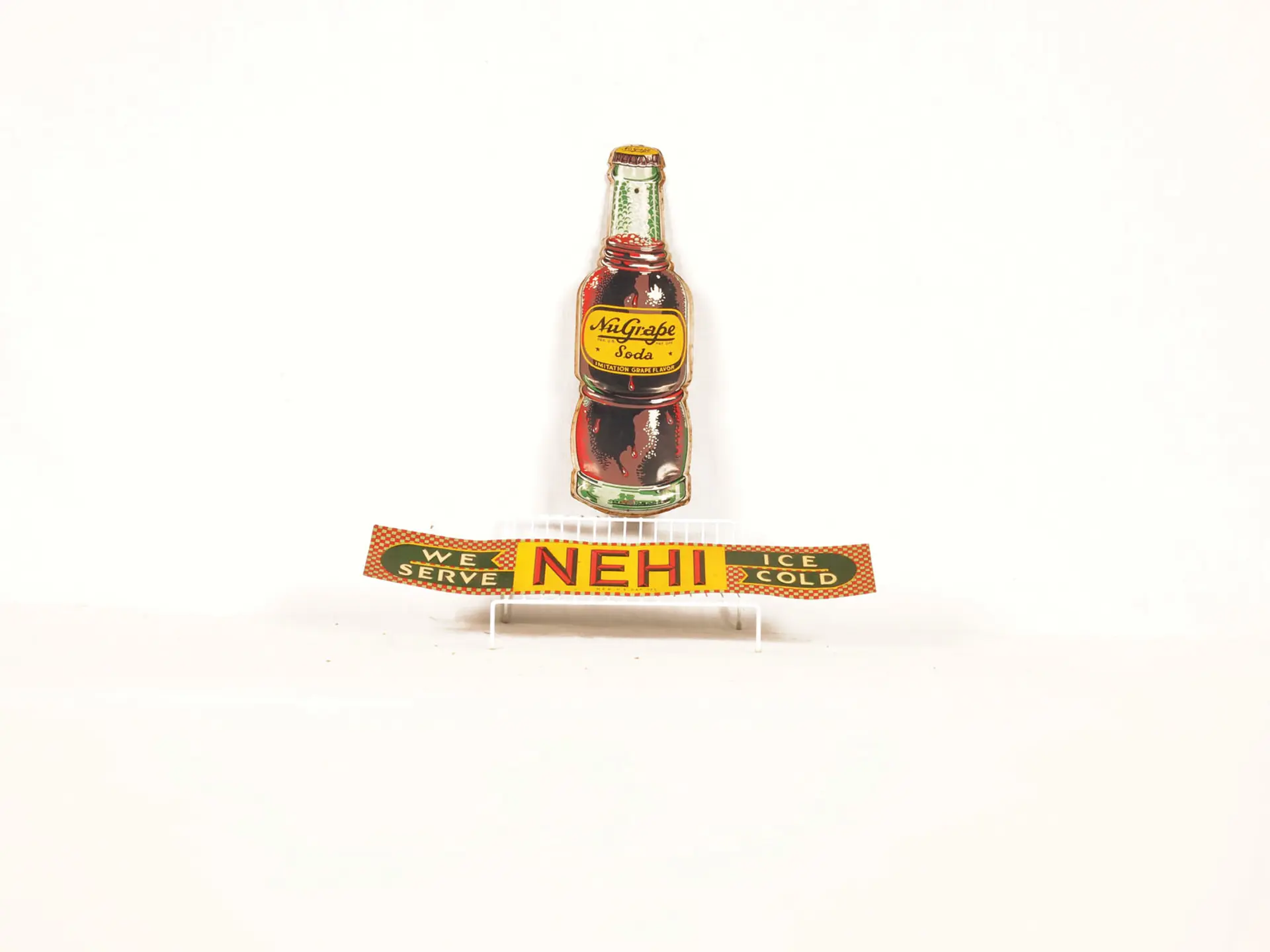 NuGrape Embossed Tin Soda Bottle Sign together with Nehi Tin Sign ...
