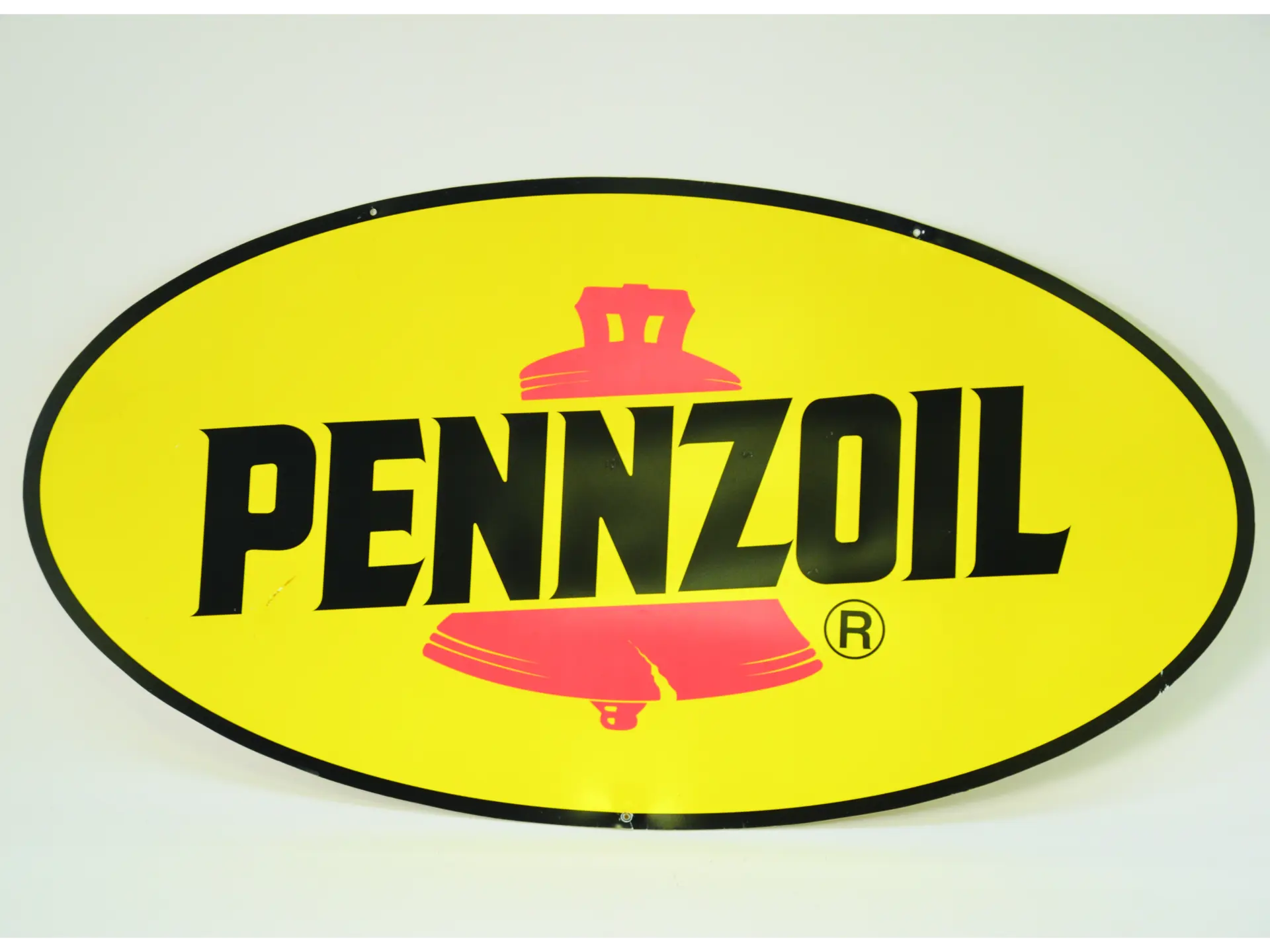 A plastic Pennzoil advertising sign | Auburn Fall 2016 | RM Sotheby's